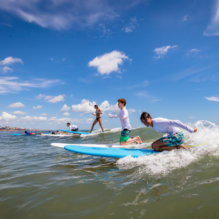 Group Surf Lesson Sandbridge, Virginia Beach | Ocean Rentals LTD